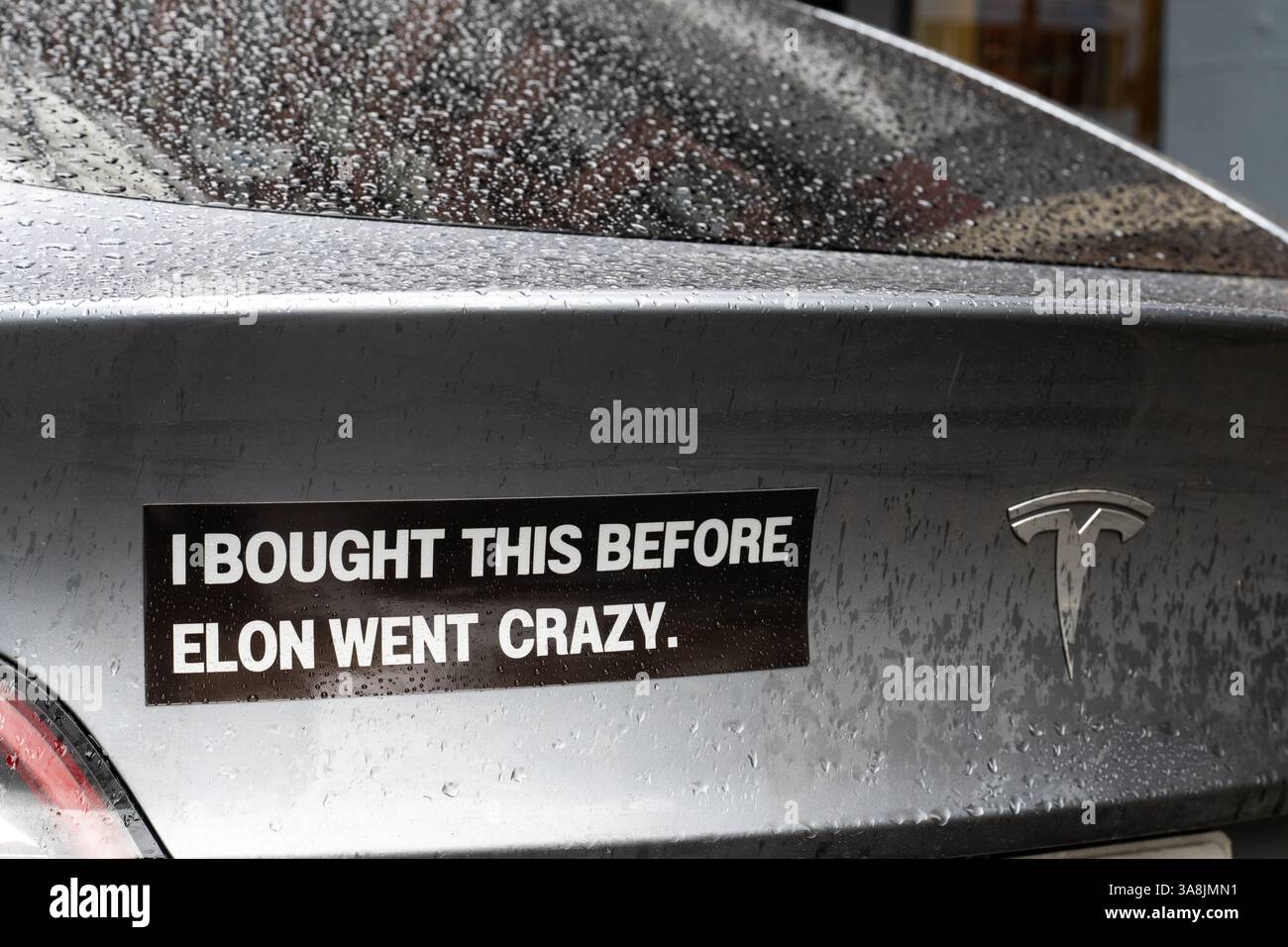 Seattle, USA. 28th Mar 2025. Anti - Elon Musk stickers seen on a Tesla ...