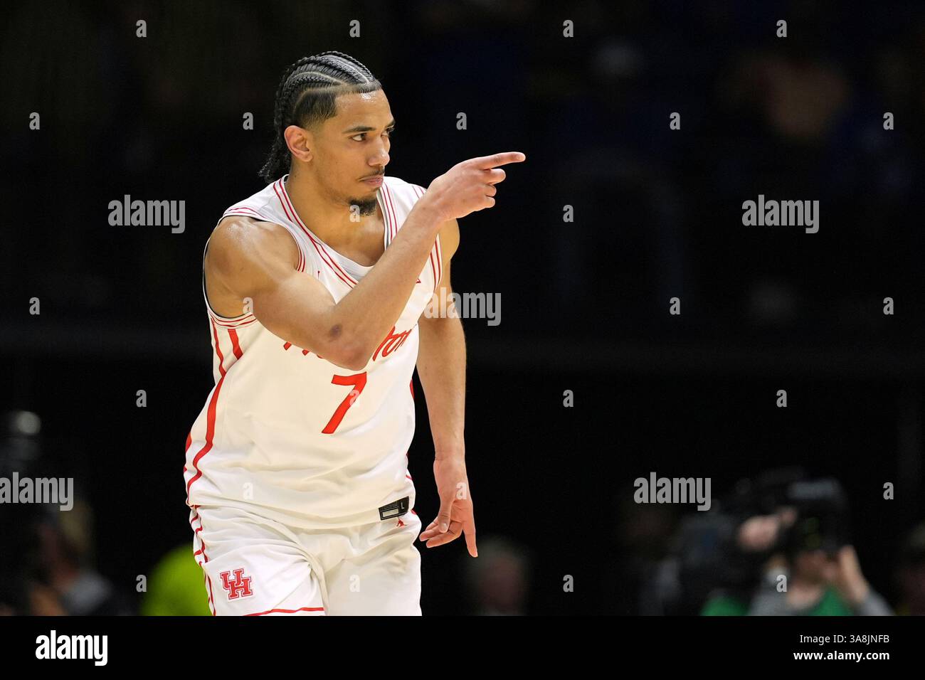 Houston's Milos Uzan points during the second half in the Sweet 16 of ...