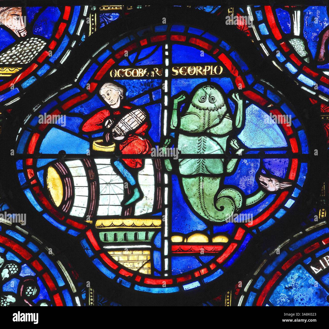 October 15, 2013 - Chartres, France - A man sits astride a barrel of ...