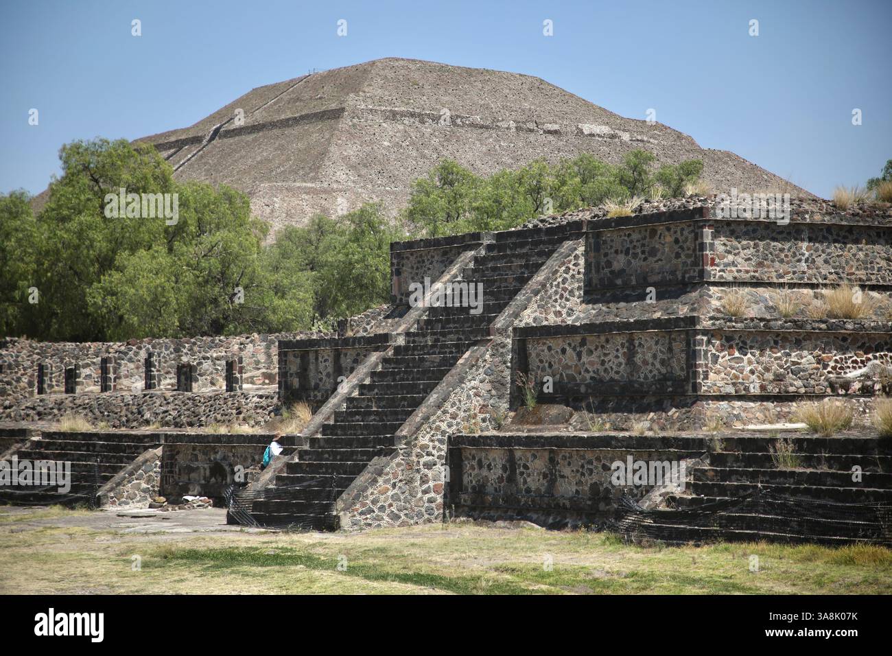 A temple, built in a talud-tablero architectural style, is seen on the ...
