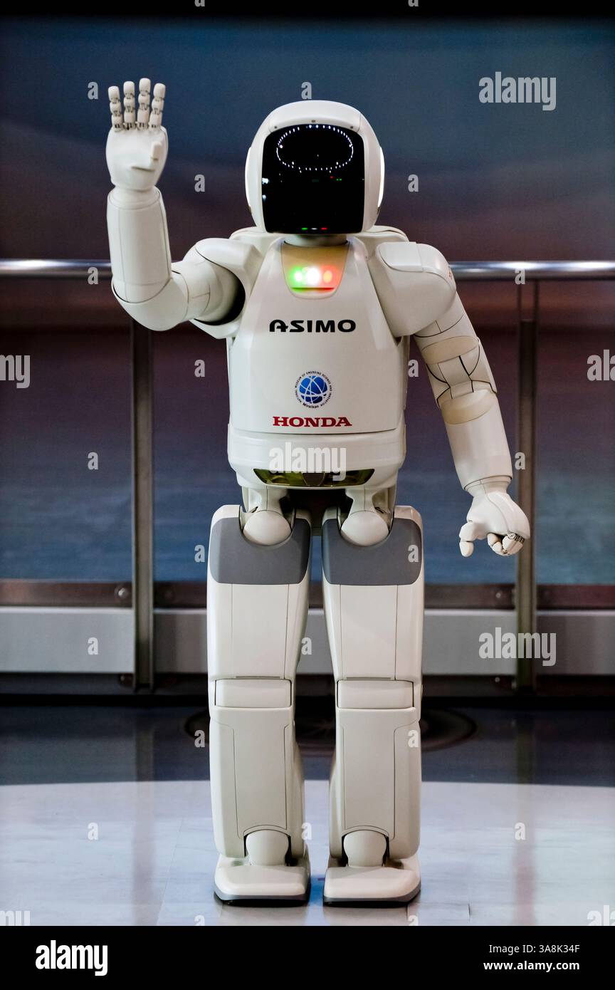 Honda's ASIMO (Advanced Step in Innovative Mobility) humanoid robot was ...