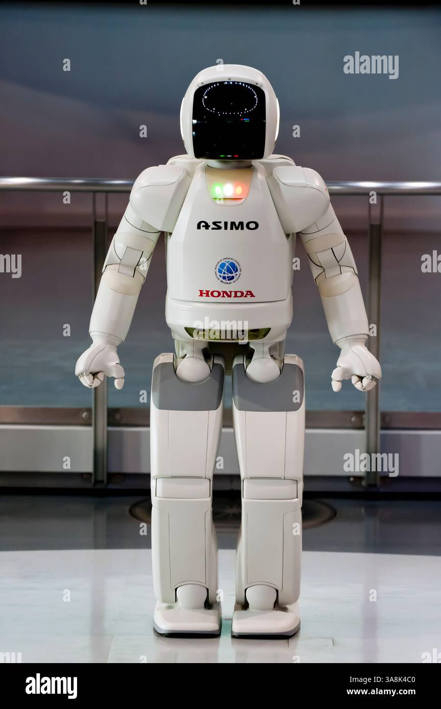Honda's ASIMO (Advanced Step in Innovative Mobility) humanoid robot was ...