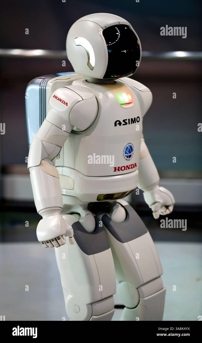 Honda's ASIMO (Advanced Step in Innovative Mobility) humanoid robot was ...