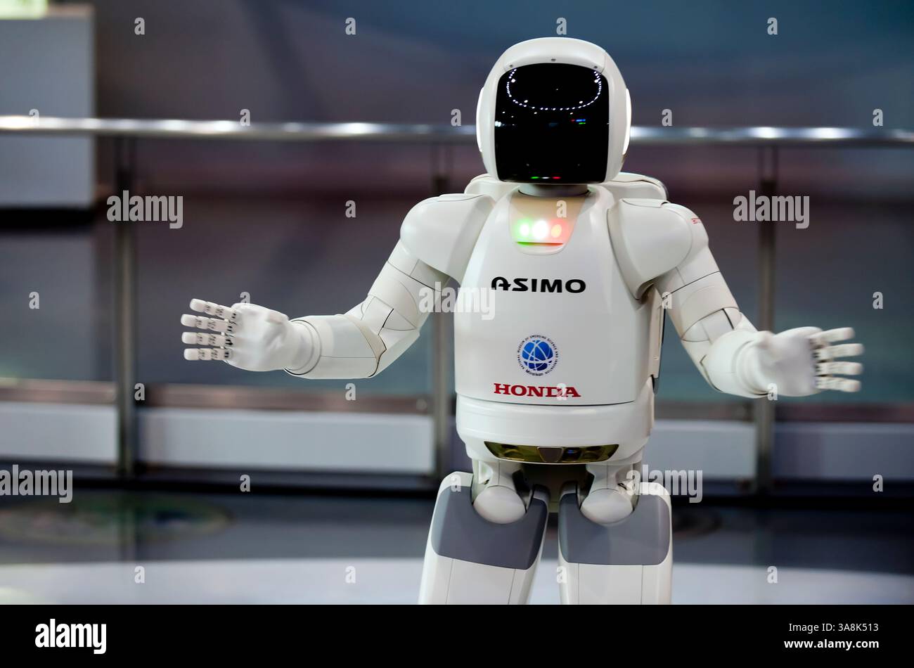 Honda's ASIMO (Advanced Step in Innovative Mobility) humanoid robot was ...