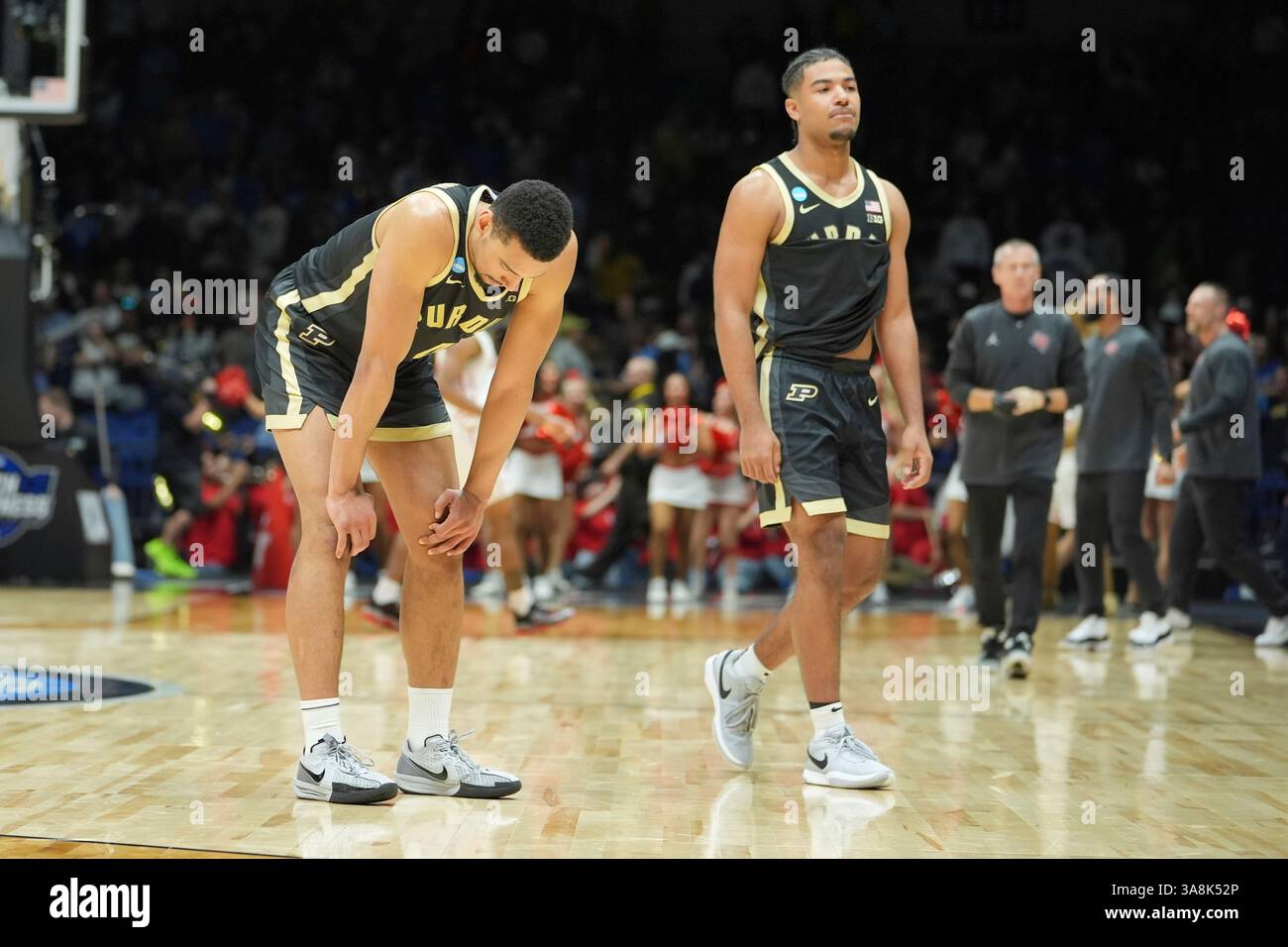 Purdue's Trey Kaufman-Renn, left, and C.J. Cox, right, react after ...