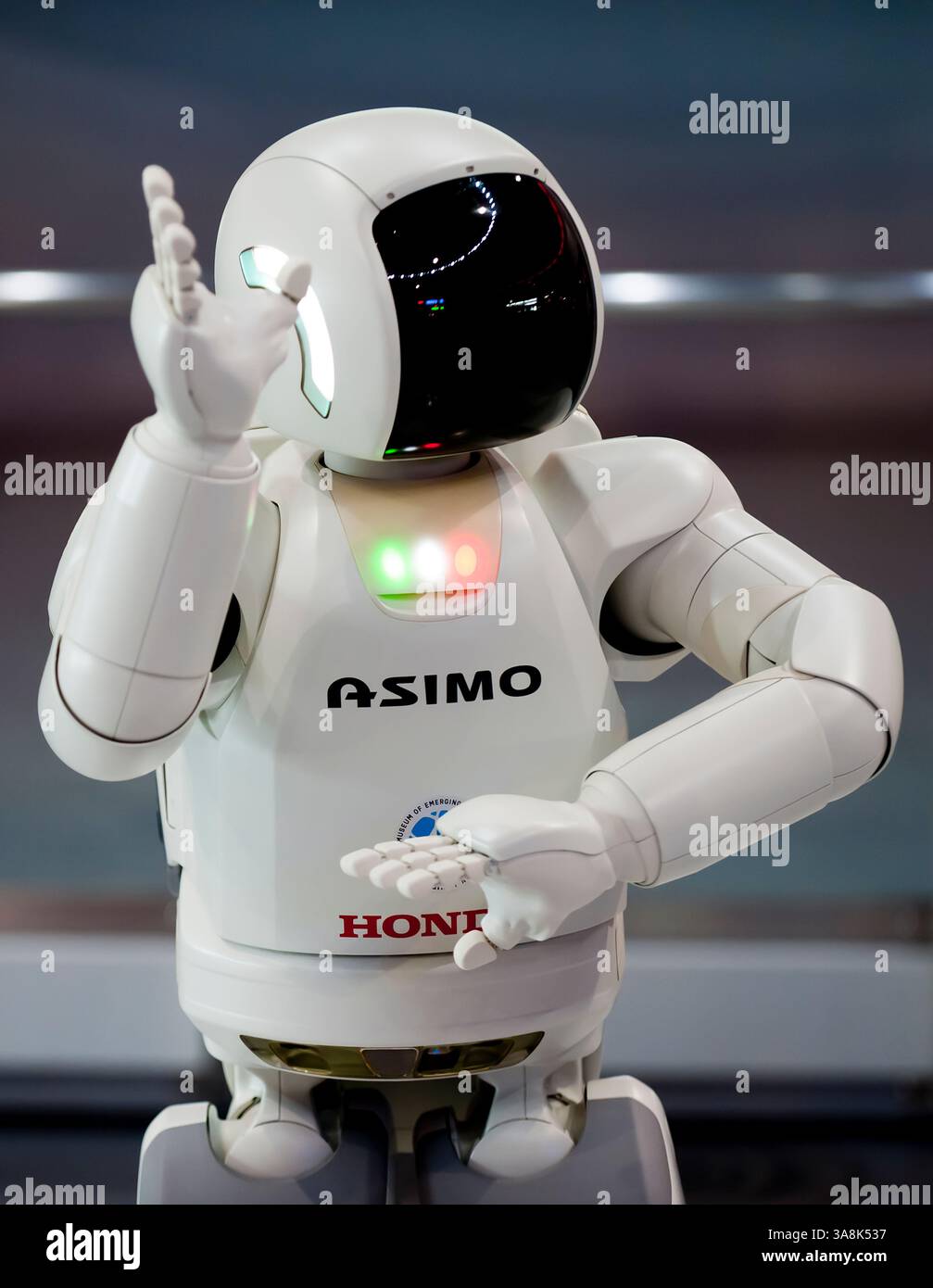 Honda's ASIMO (Advanced Step in Innovative Mobility) humanoid robot was ...