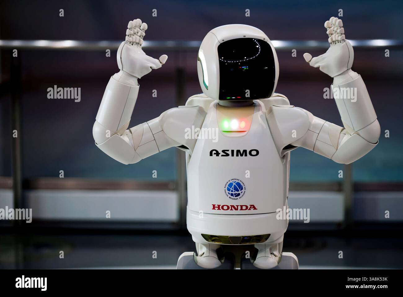 Honda's ASIMO (Advanced Step in Innovative Mobility) humanoid robot was ...