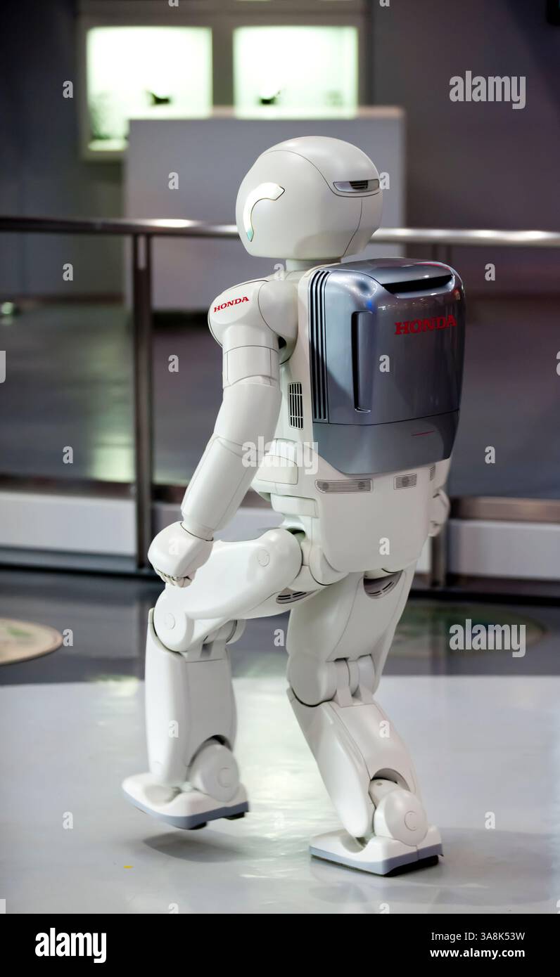 Honda's ASIMO (Advanced Step in Innovative Mobility) humanoid robot was ...