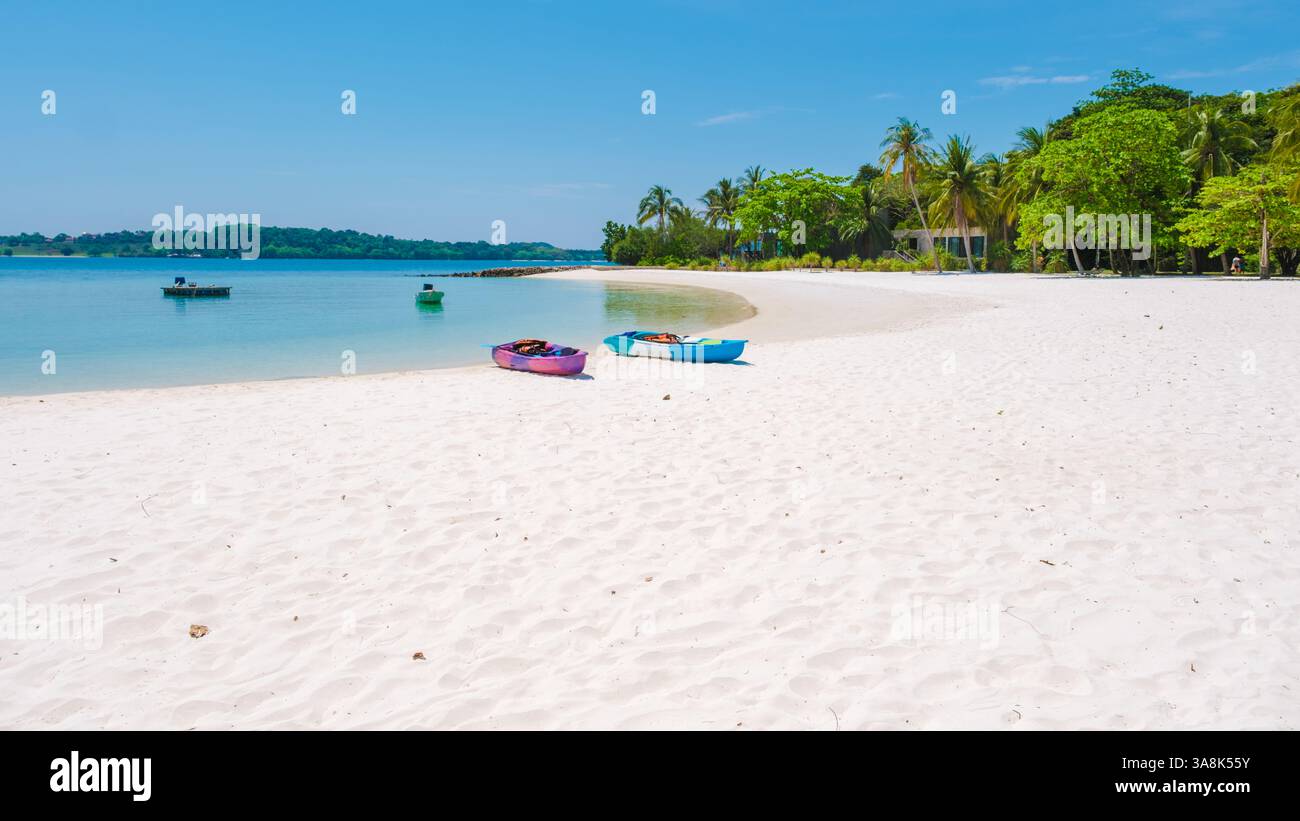 Soft white sand meets tranquil turquoise waters on Koh Kham Island ...