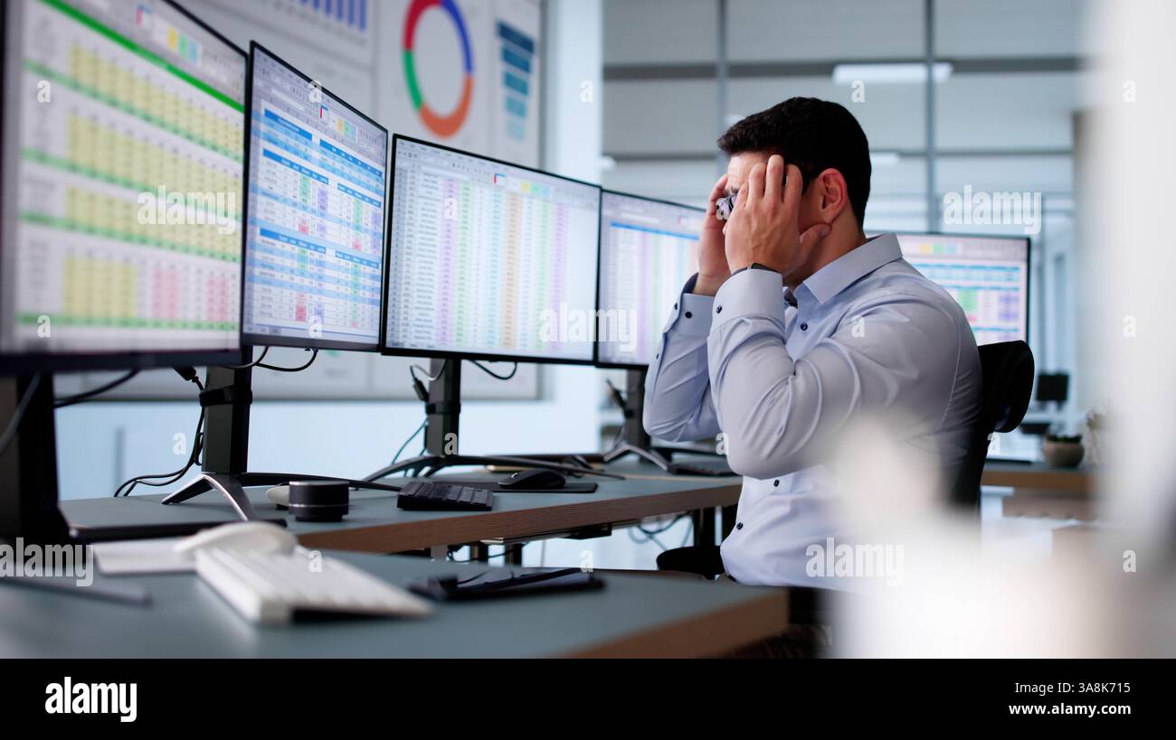Data Analyst African Man Using Spreadsheet On Computer Stock Photo - Alamy