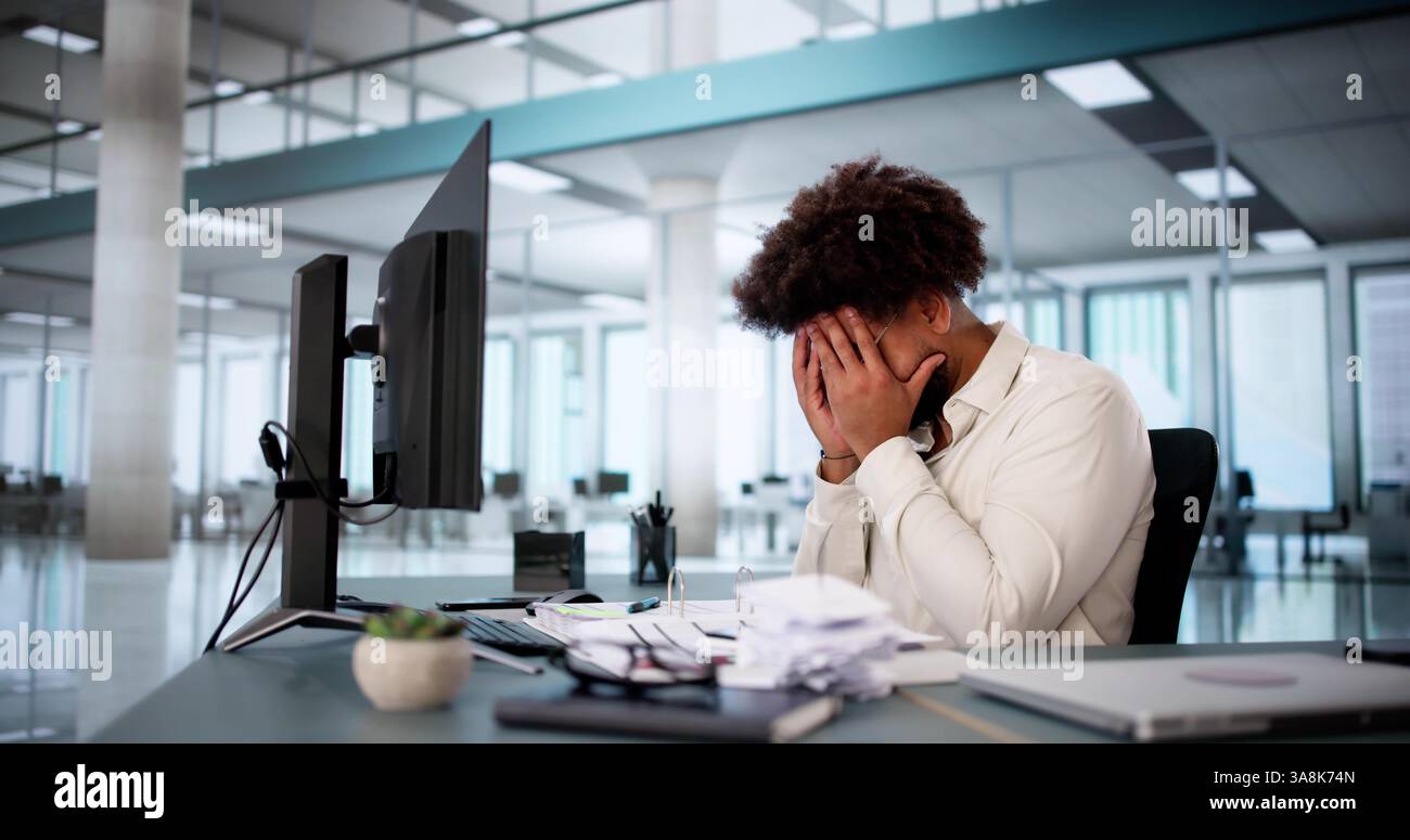 Sad African American Accountant Feeling Overwhelmed At The Office Desk ...