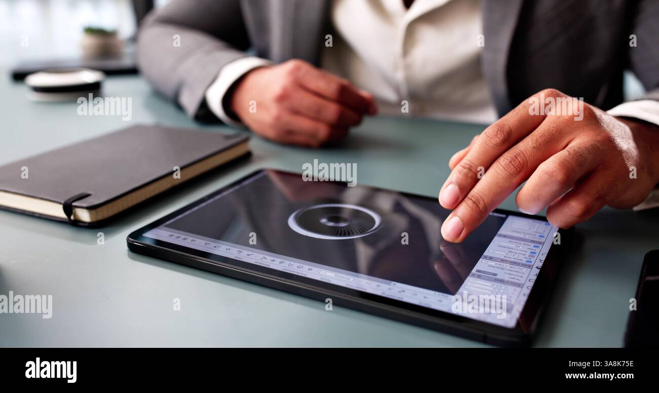 Young African-American Man Using 3D CAD Software Designing Aircraft ...