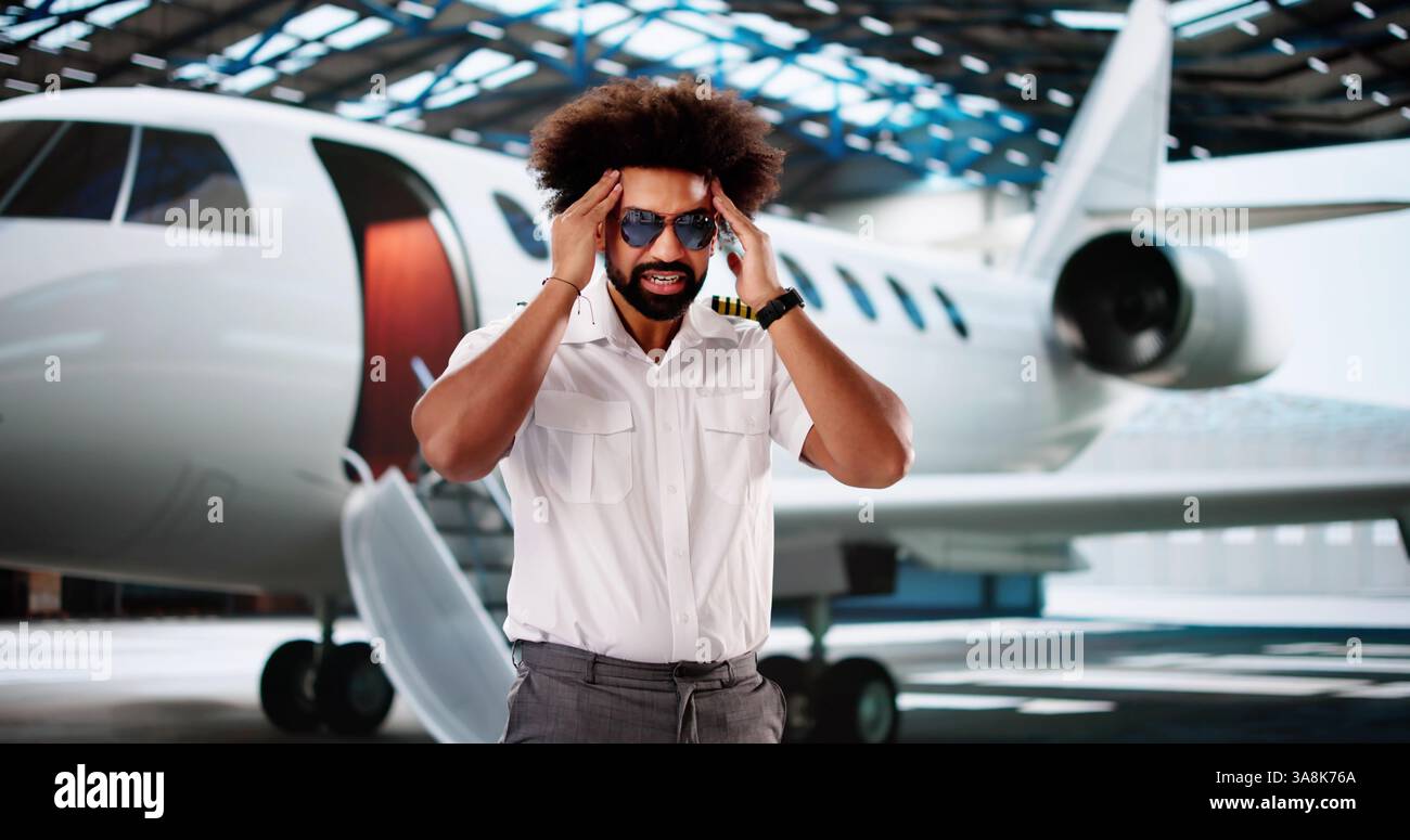 Anxious Black Pilot Praying for Safety on Stressful Flight Journey ...