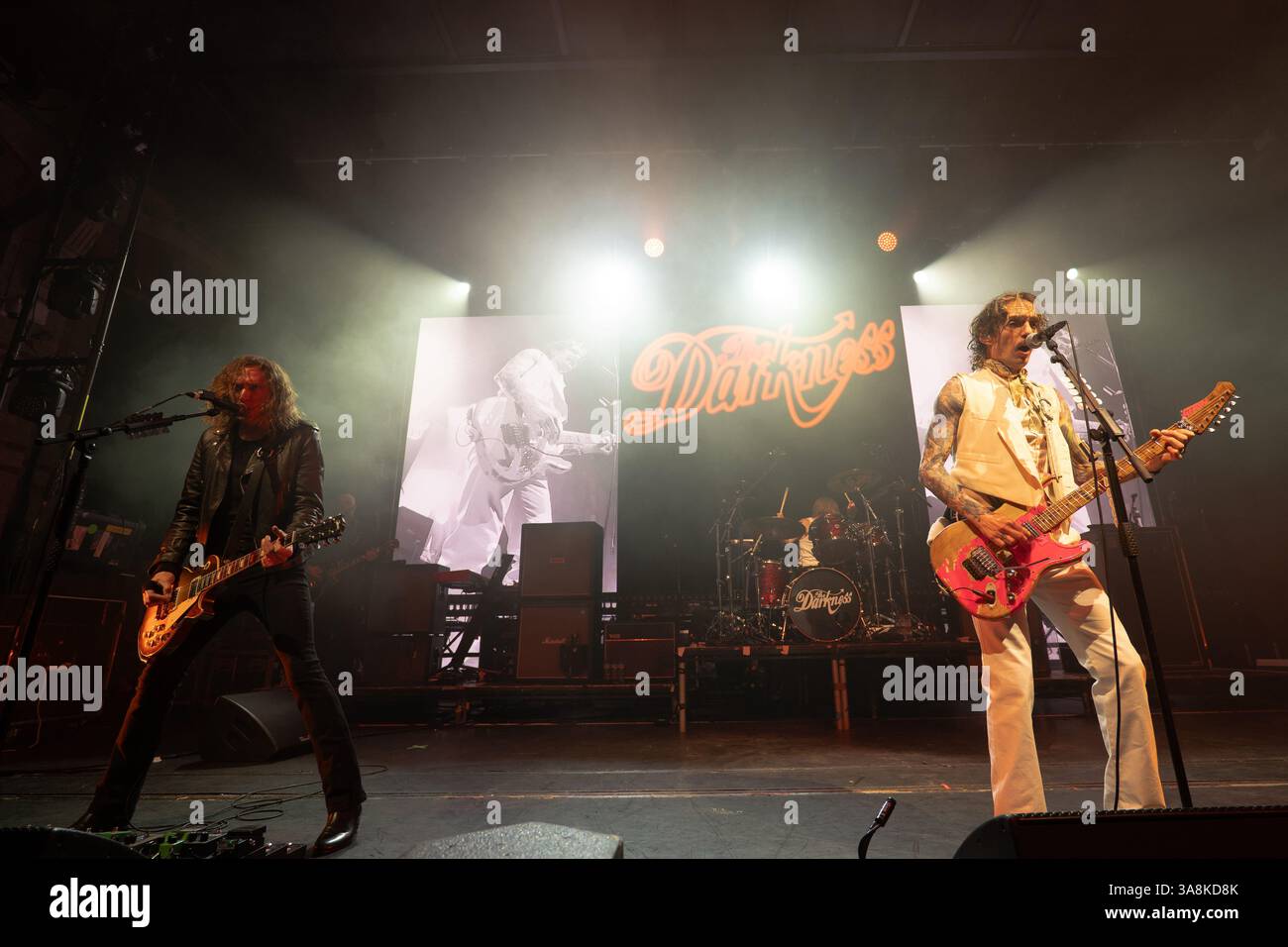 Cambridge, UK, 28 March, 2025. The Darkness in concert. Pictured left ...