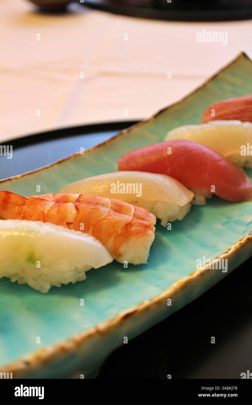 Japanese cuisine: assorted nigiri sushi (tuna, shrimp, squid, etc.) in ...