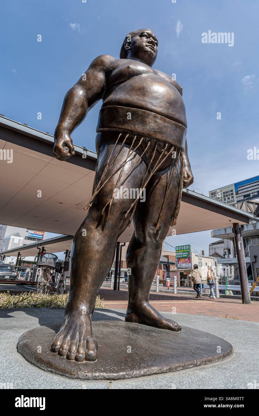 A statue of sumo wrestler Ozeki Kaio in front of Nogata Station in ...