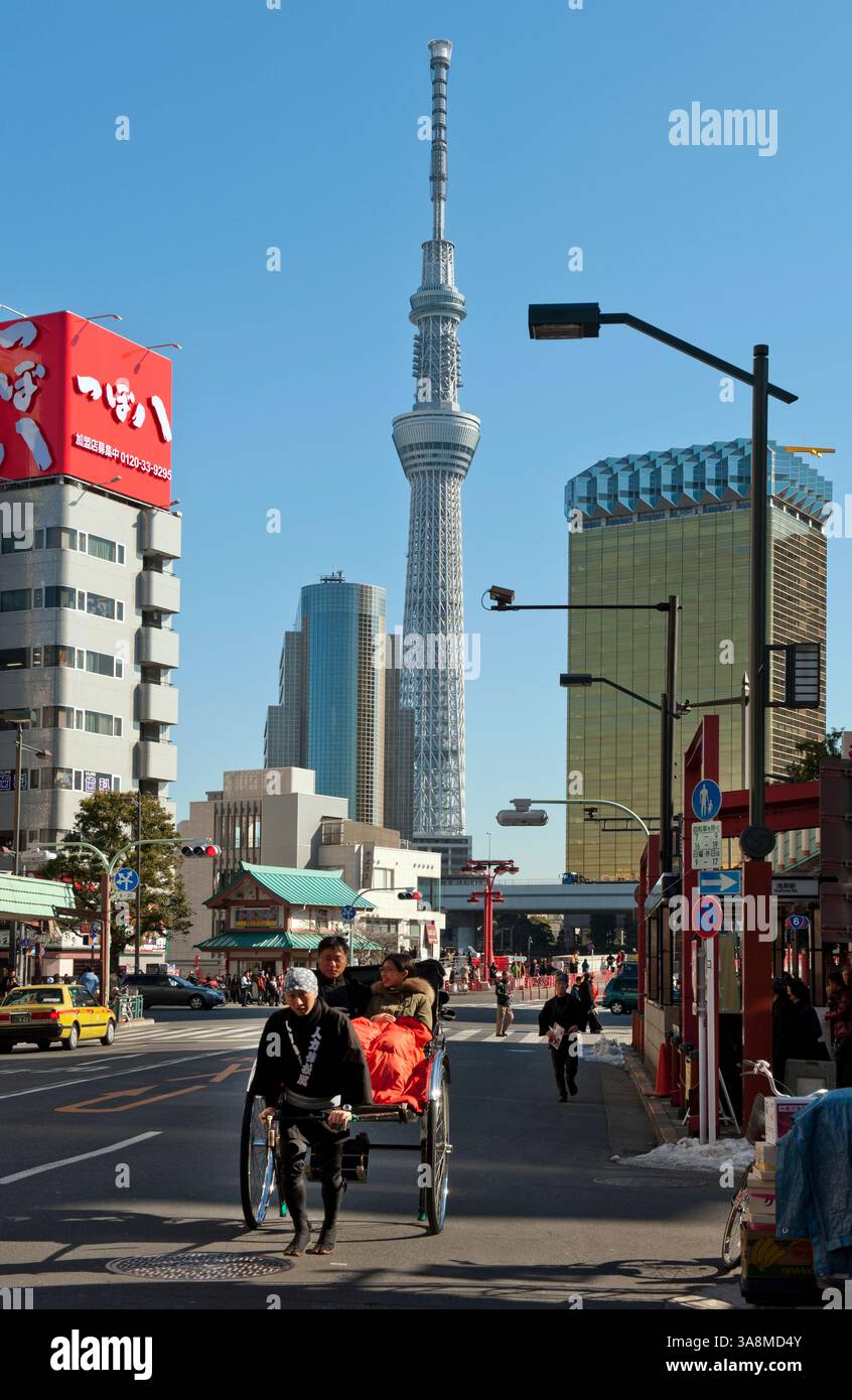 Tokyo Skytree, the radio and TV broadcasting tower, rising high above ...