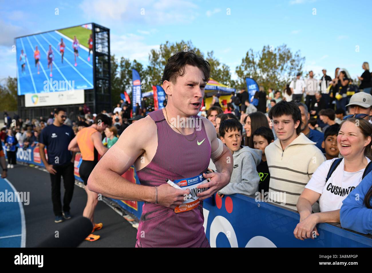 Lachlan Kennedy celebrates winning the 100 meter mens final at the 2025 ...