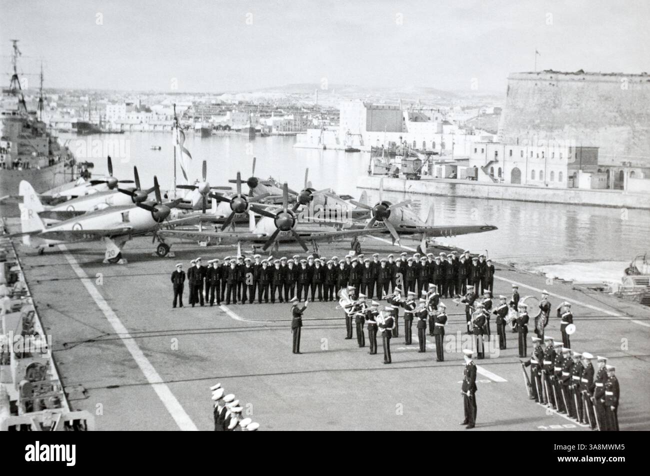 HMS Glory (R62) with Hawker Sea Furies on deck leaving the Grand ...