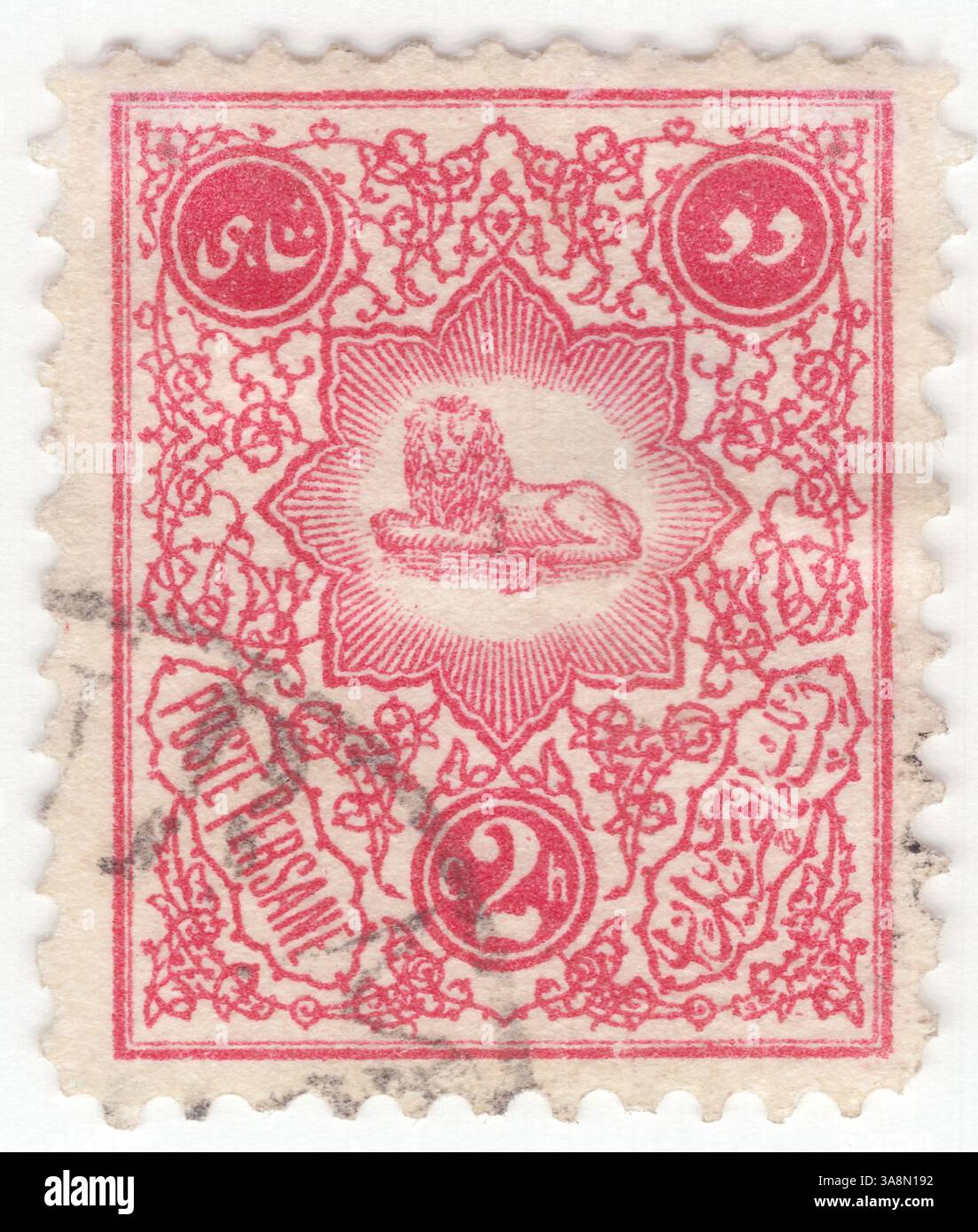 IRAN - 1885: An 2 chahis rose postage stamp depicting "Lion on Sun". It ...