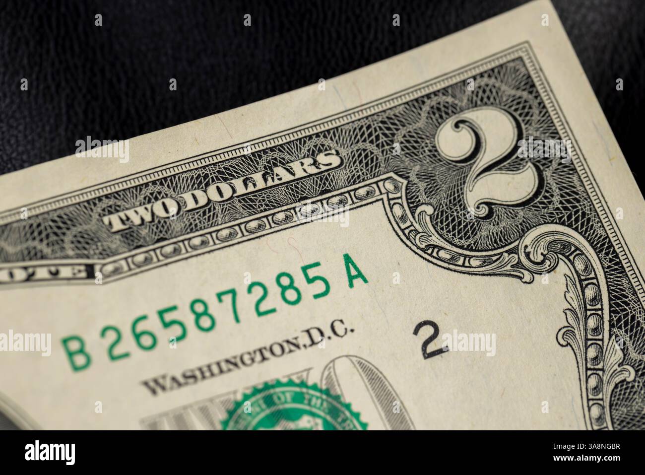 two American dollar bill, two United States dollar paper banknote parts ...