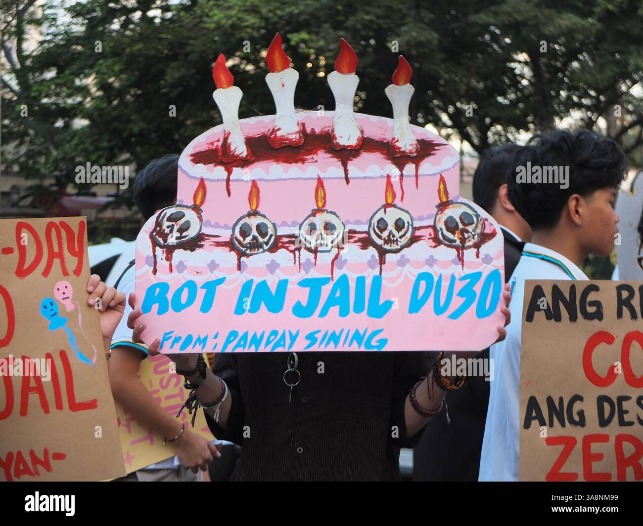 A cake props made of cardboard with a message that former Philippine ...