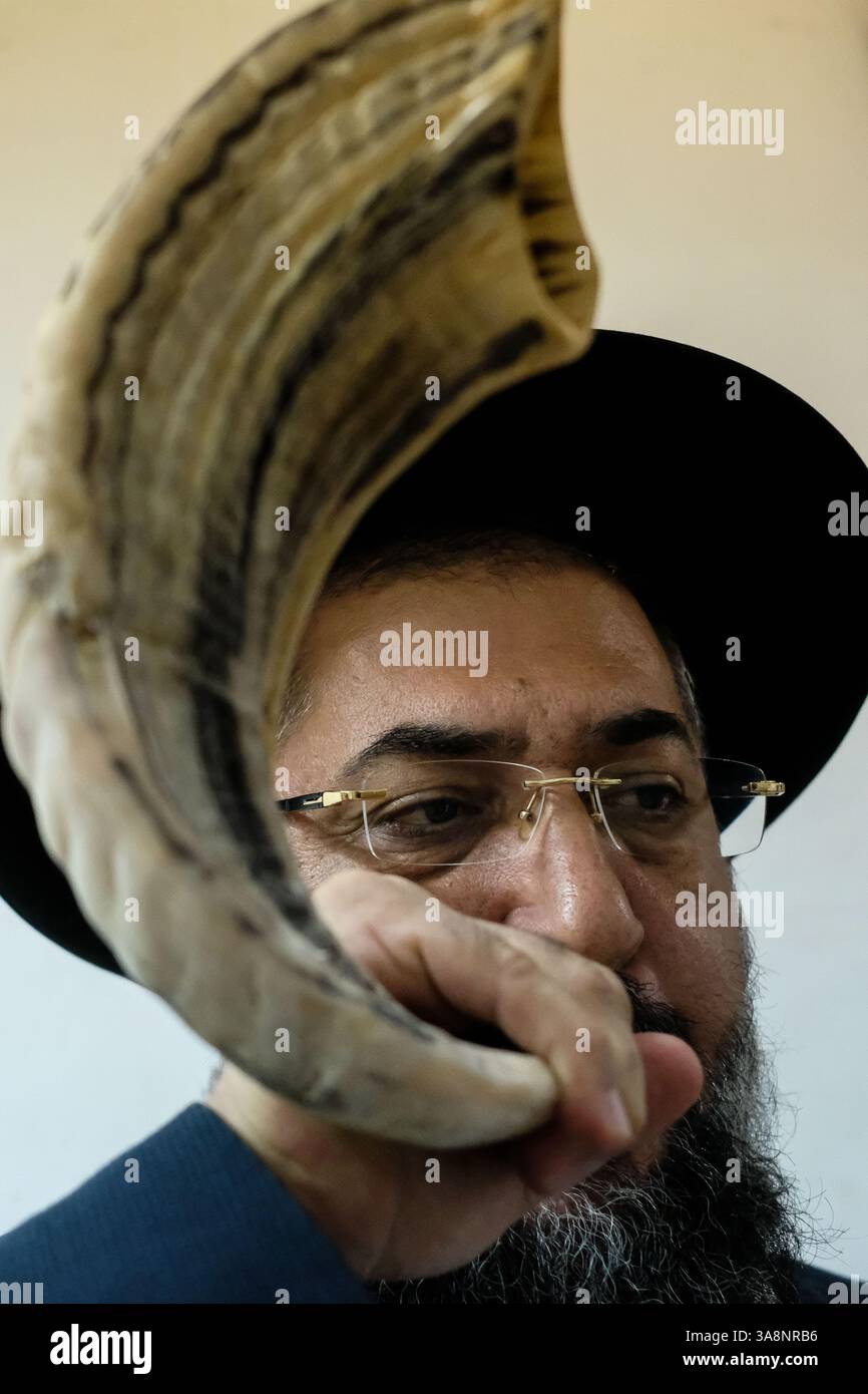 September 14, 2017 - Tel Aviv, Israel - A buyer tries out a shofar, an ...