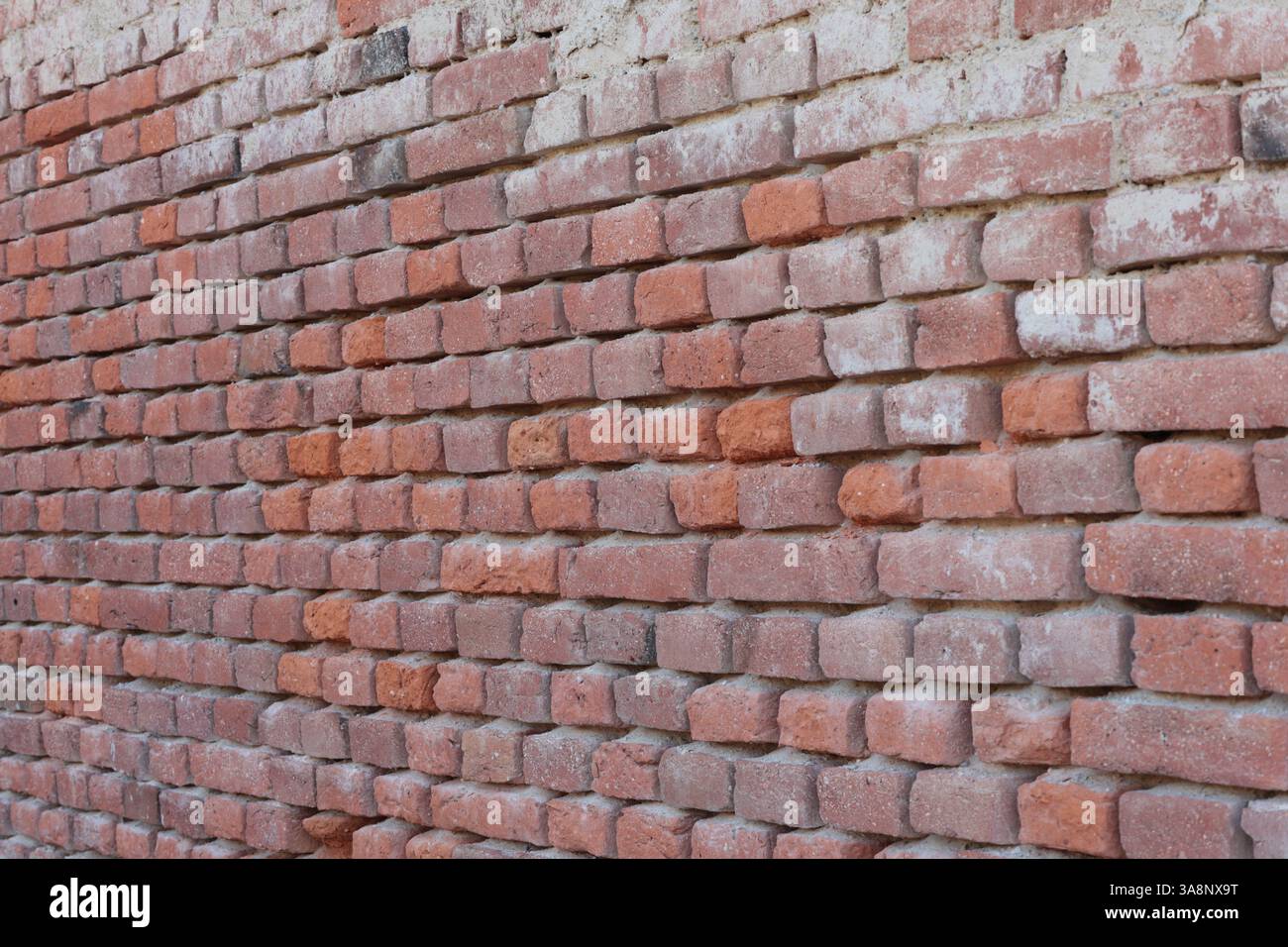 unmaintained old brick wall made only of bricks without plaster Stock ...