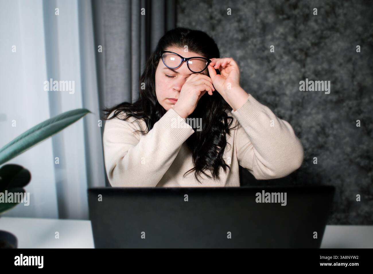 Tired business woman having fatigue and headache during work with ...
