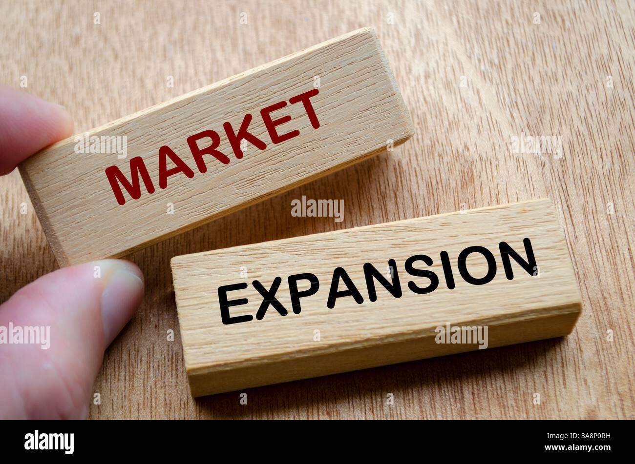 Market Expansion text on wooden blocks. Market and Business strategy ...