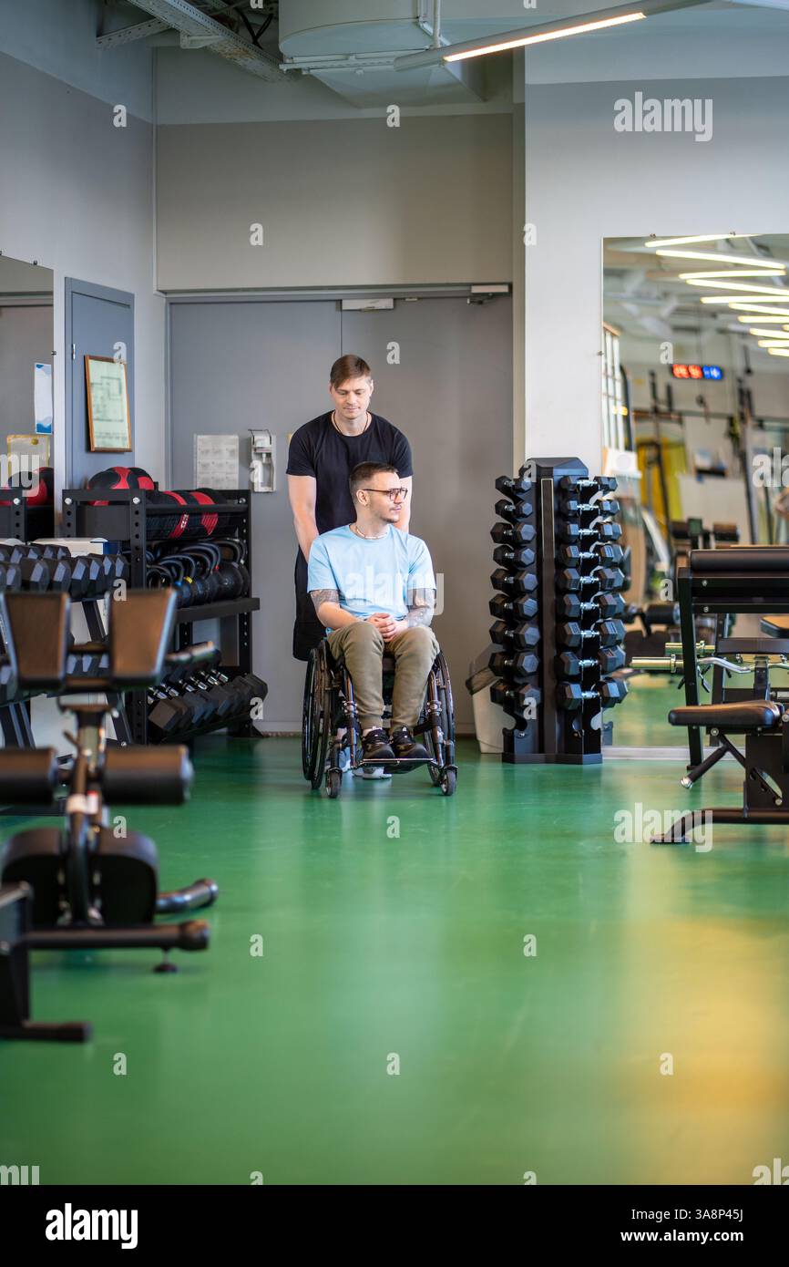 Diverse male coach disabled athlete hi-res stock photography and images ...