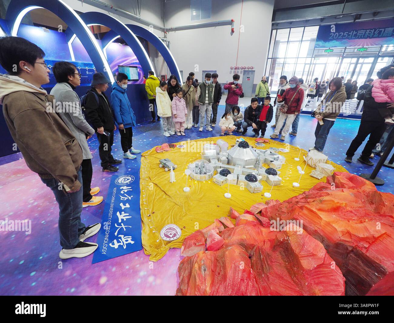 BEIJING, CHINA - MARCH 29, 2025 - Visitors visit the "Mars Base model ...