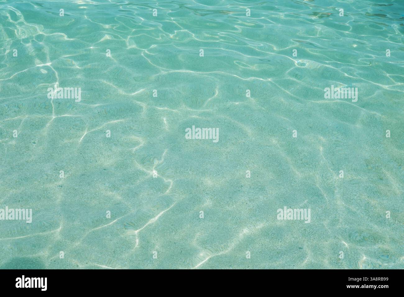 Clear turquoise water, sunlight reflecting, symbolizing natural beauty ...