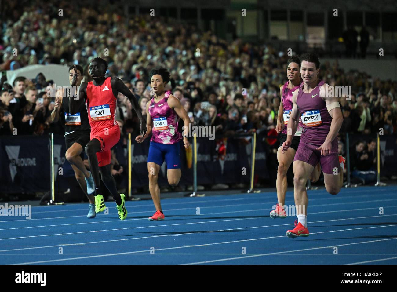Lachlan Kennedy (right) wins the 200m Peter Norman Memorial final during the Maurie Plant Meet ...
