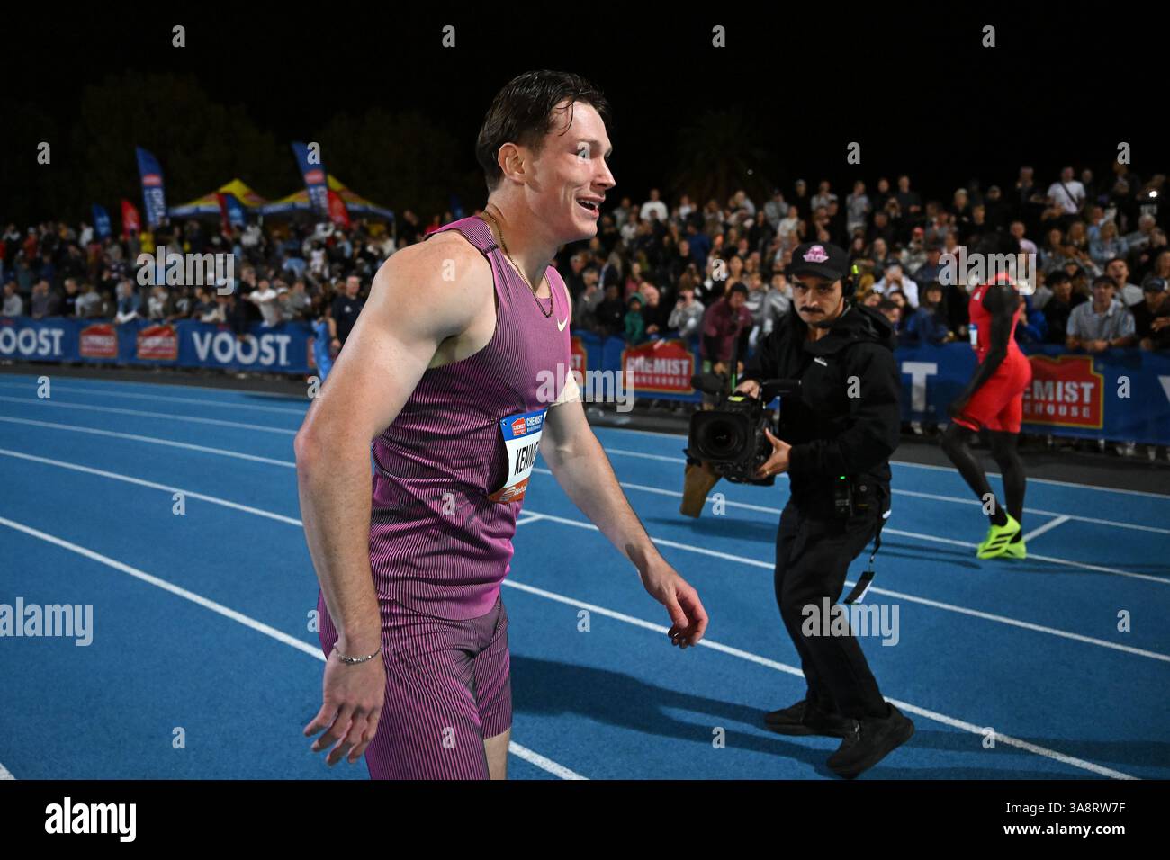 Lachlan Kennedy celebrates after winning the the 200m Peter Norman ...