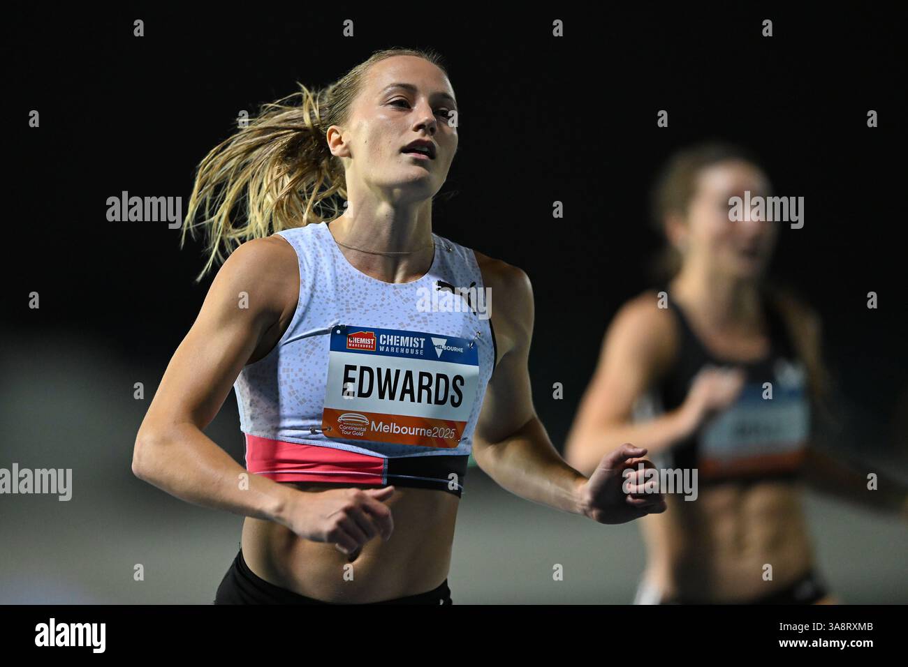 Kristie Edwards (left) celebrates winning the womens 200m final during ...