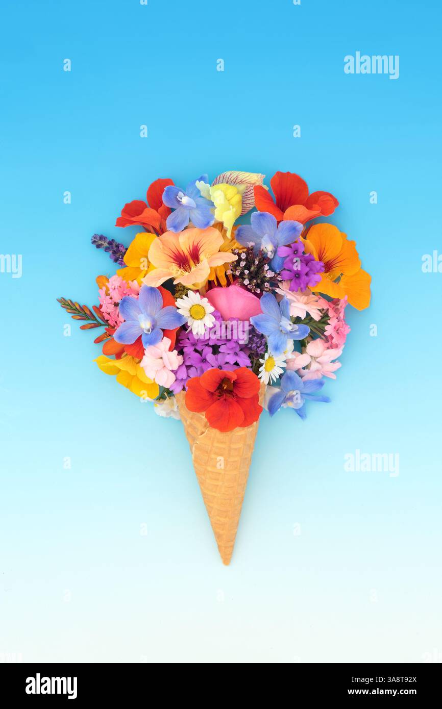 Surreal ice cream cornet with colorful summer flowers on gradient blue ...