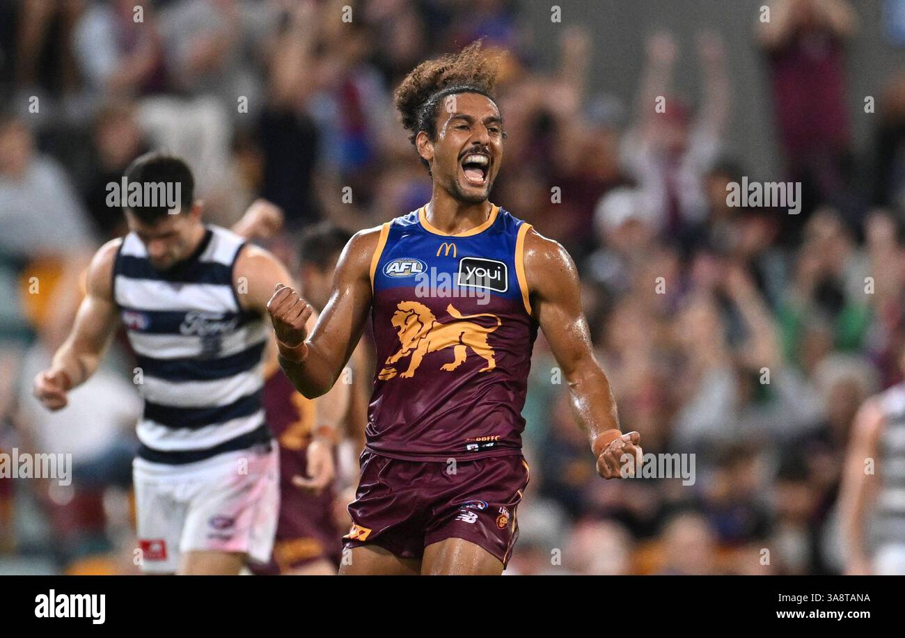 Bruce Reville of the Lions celebrates during the AFL Round 3 match ...