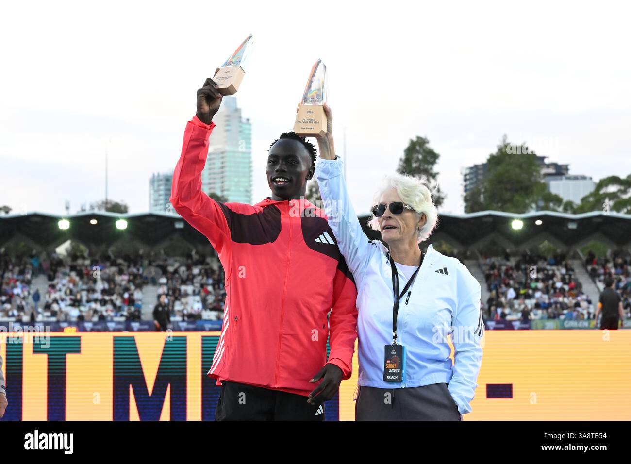 Melbourne, Australia. 29th Mar, 2025. Gout Gout and his coach Di ...