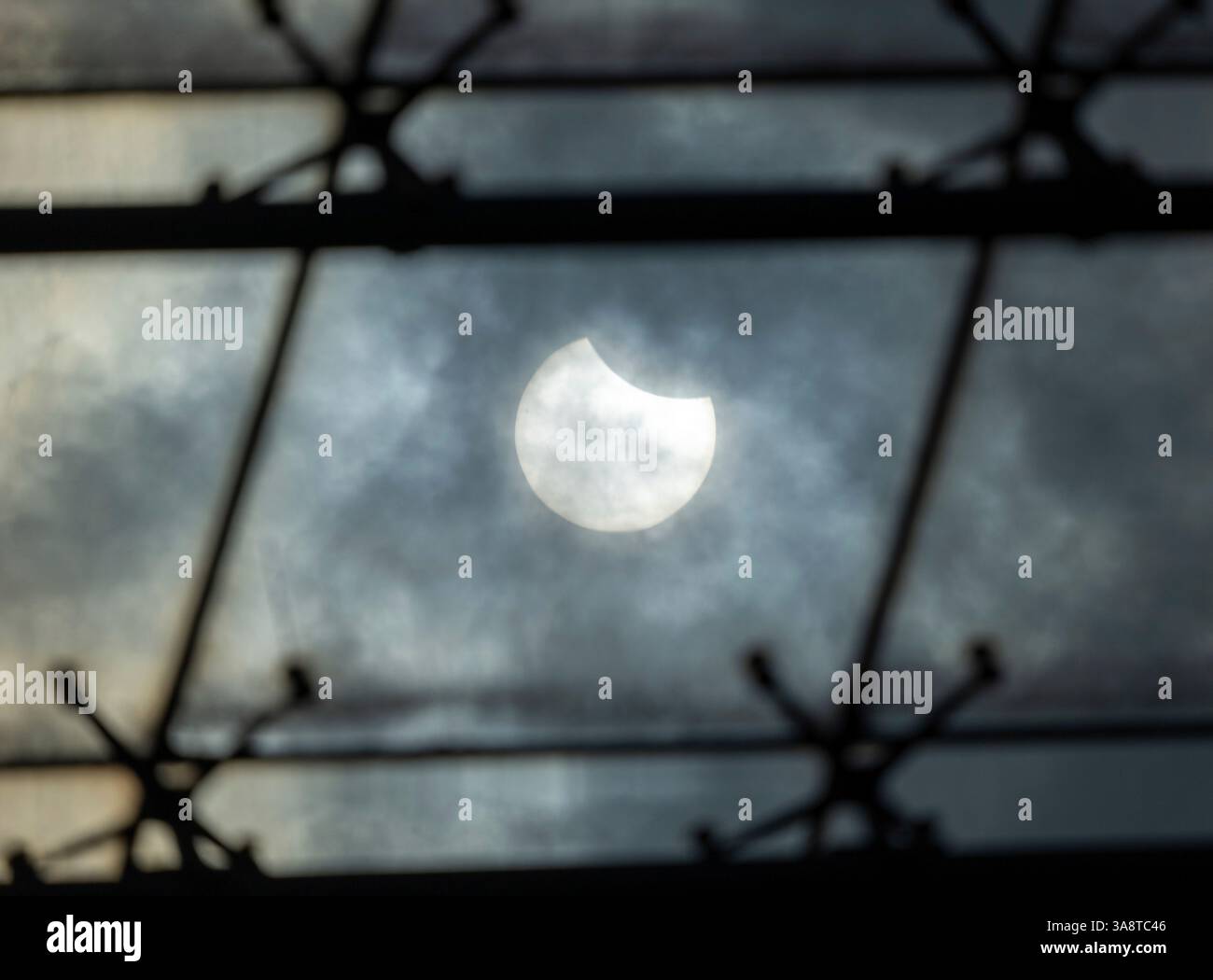A view of the beginning of a partial solar eclipse in the slightly ...
