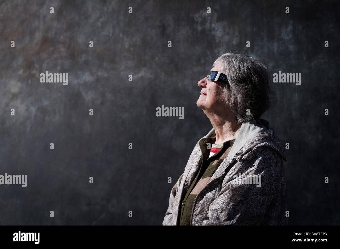 London, UK. 29th March, 2025. UK Weather: Watching the partial solar ...