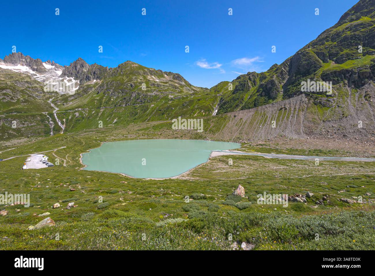 The Swiss Alps pass Sustenpass and the glacial lake Steinsee in sommer ...