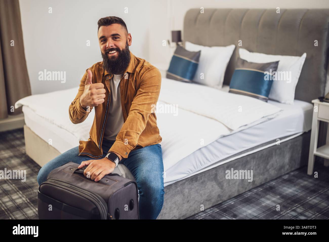 Man sitting up in bed hi-res stock photography and images - Alamy