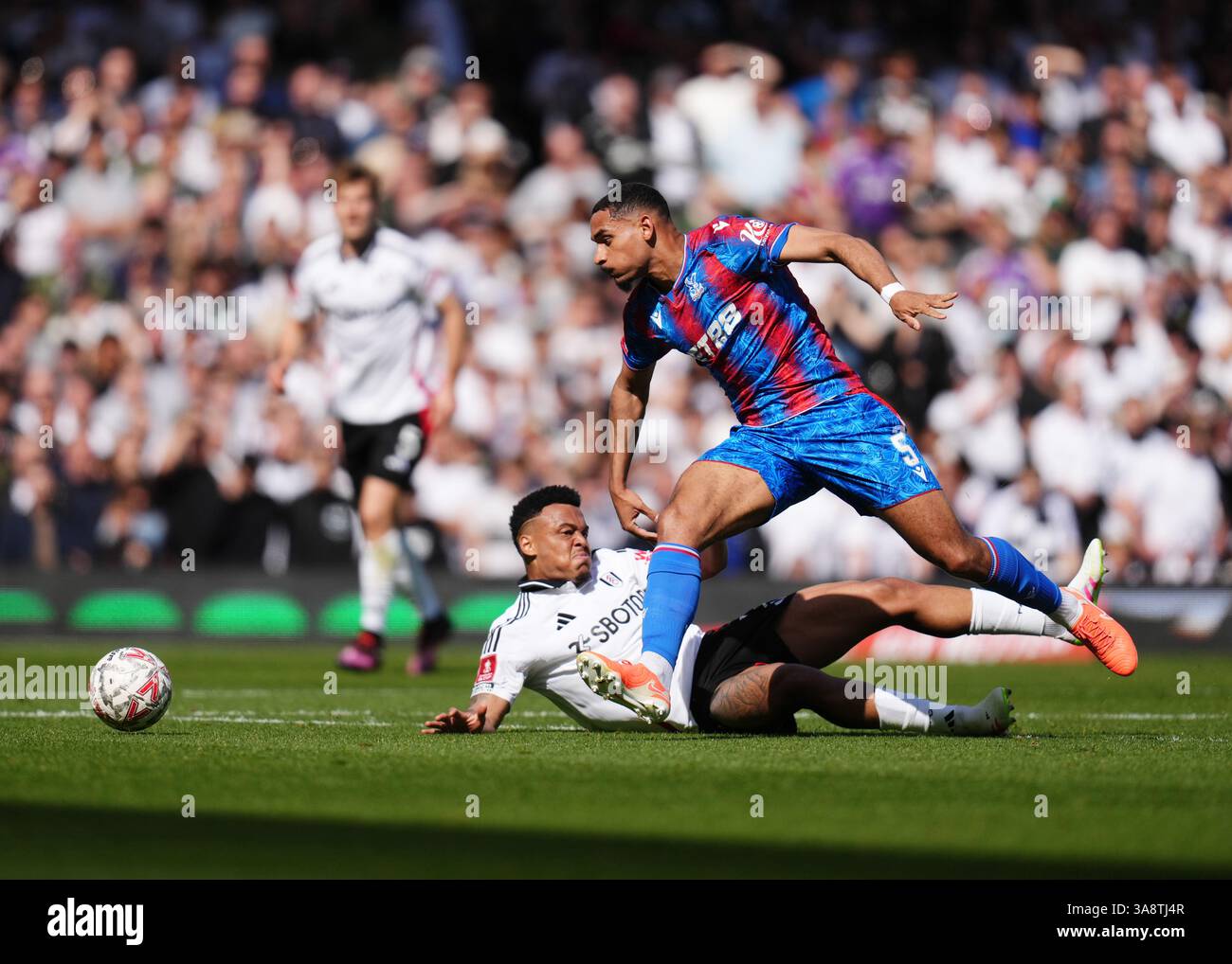 Fulham's Rodrigo Muniz and Crystal Palace's Maxence Lacroix (right ...