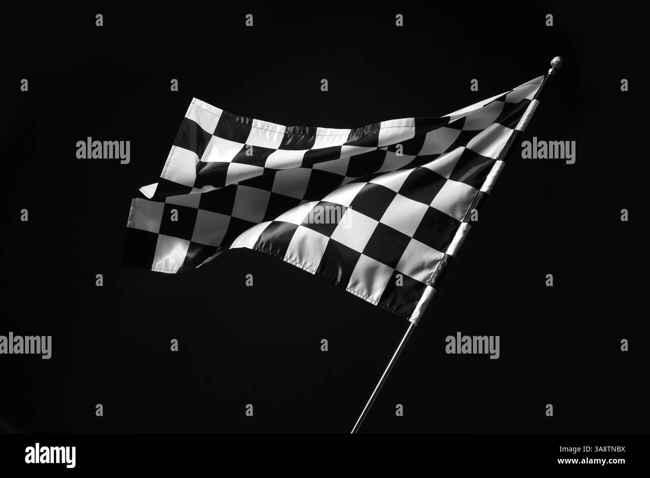 One racing checkered flag on black background Stock Photo - Alamy