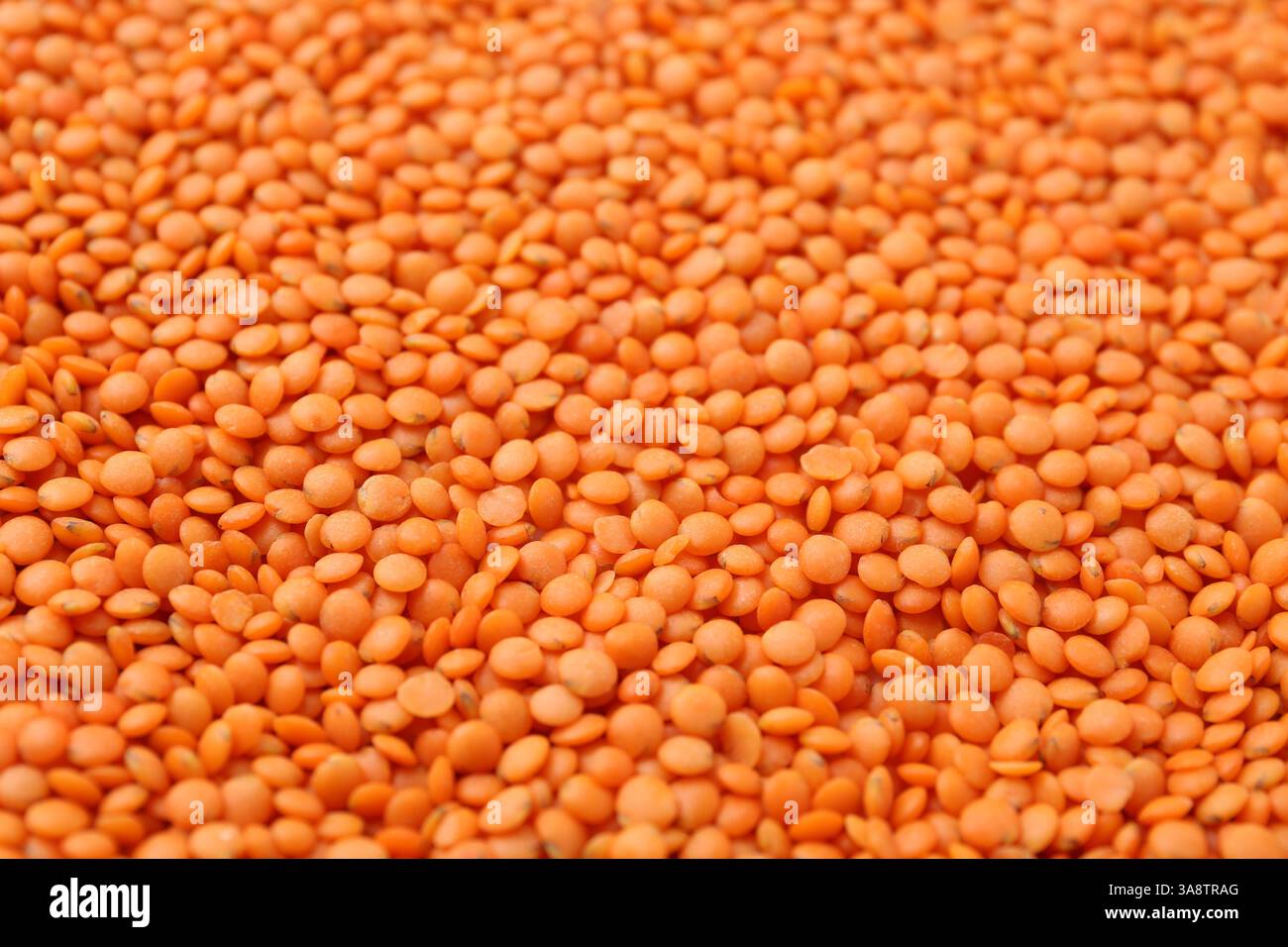 Raw red lentils as background, closeup view Stock Photo - Alamy