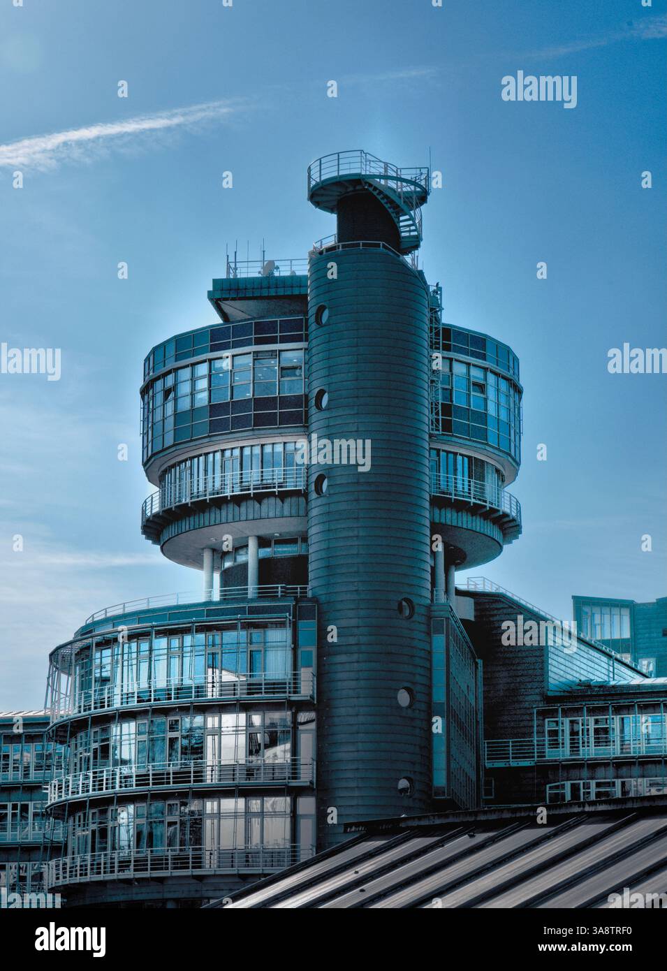 Futuristic Office Building with a Glass Facade Reflecting the Blue Sky ...