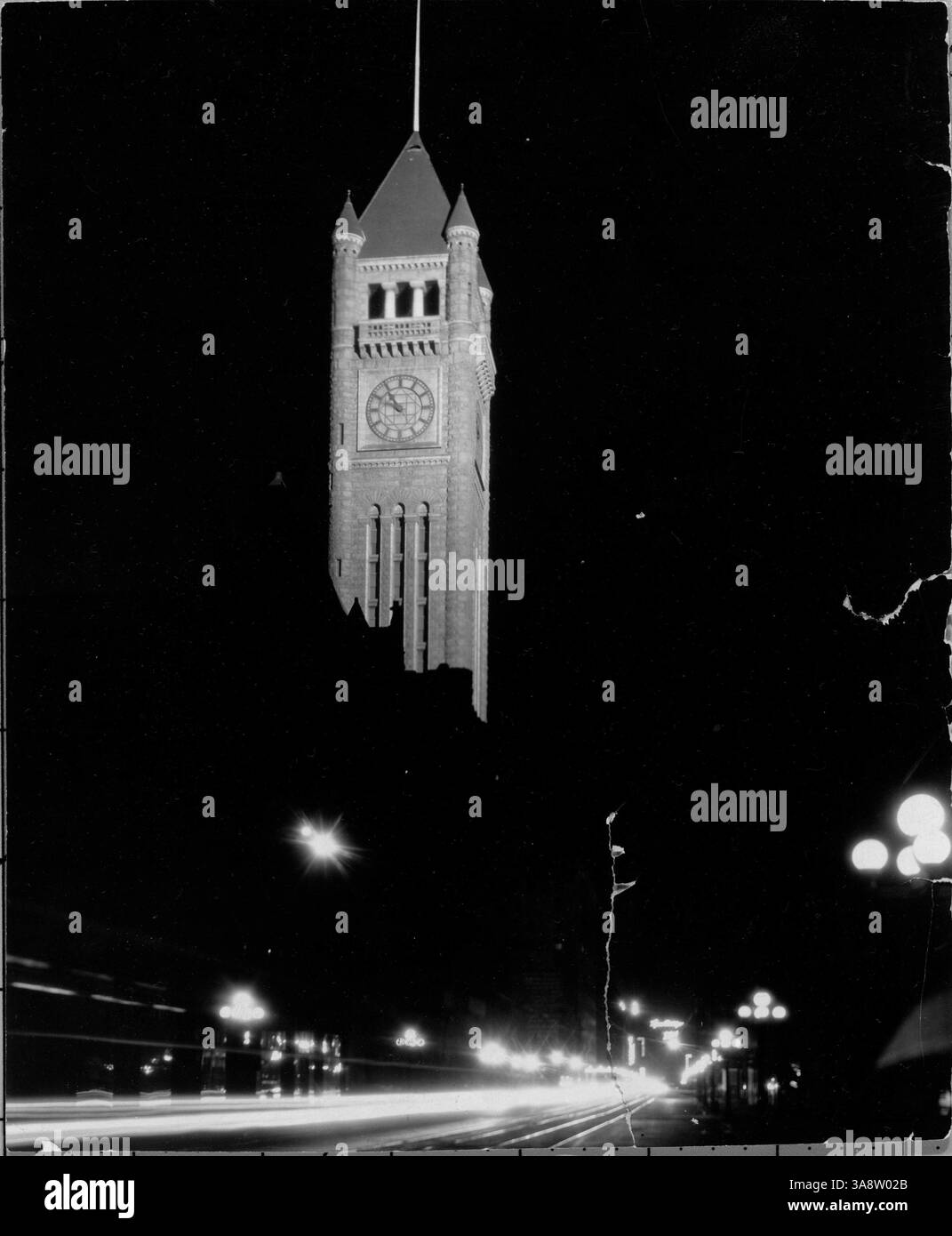 The Minneapolis City Hall Clock Tower illuminated at night by the Gold ...