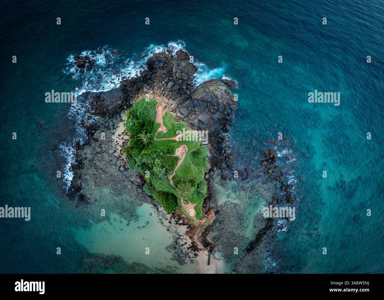 Mirissa sandy Parrot Rock island landmark aerial photo with a beautiful ...