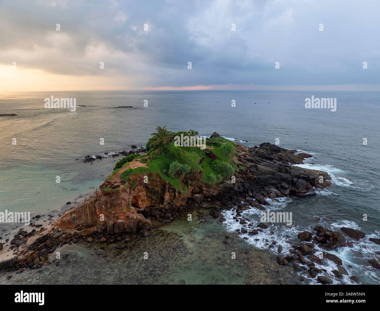 Mirissa sandy Parrot Rock island landmark aerial photo with a beautiful ...